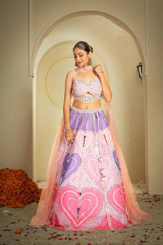 Multi-Colour Net Lehenga With Expertly Crafted Handmade Designs